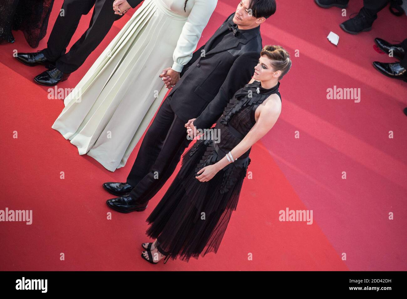 Les membres du jury Chang Chen et Kristen Stewart ont fait le tapis ...