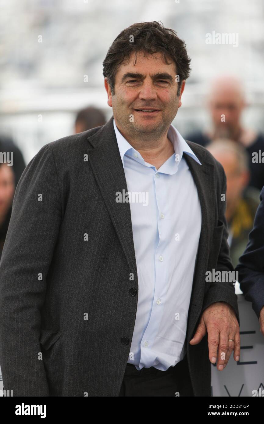Romain Goupil posant à la Traversee Photocall qui se tient au Palais ...
