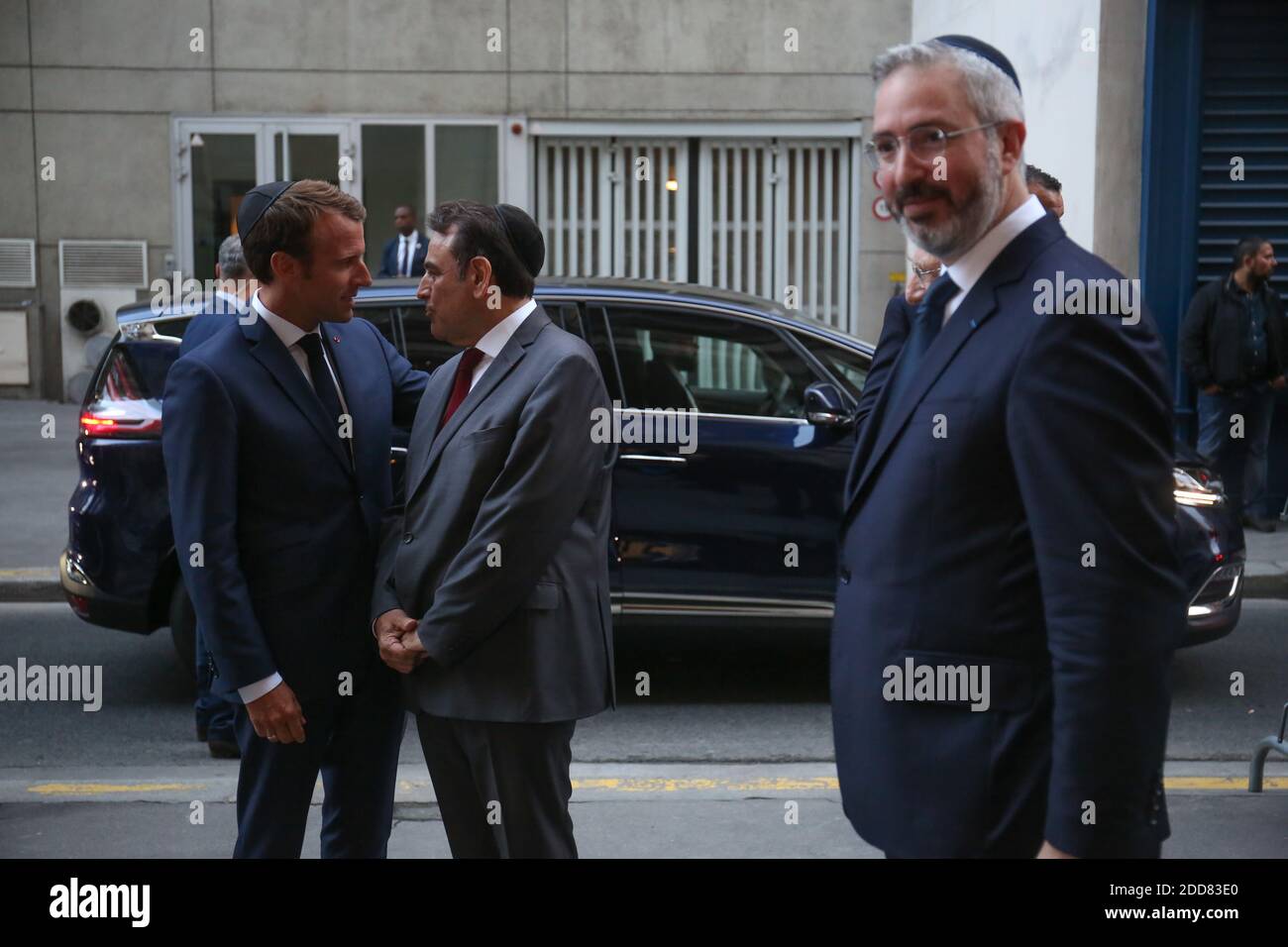 Le Président Emmanuel Macron, Joel Mergui lors d'une cérémonie marquant ...