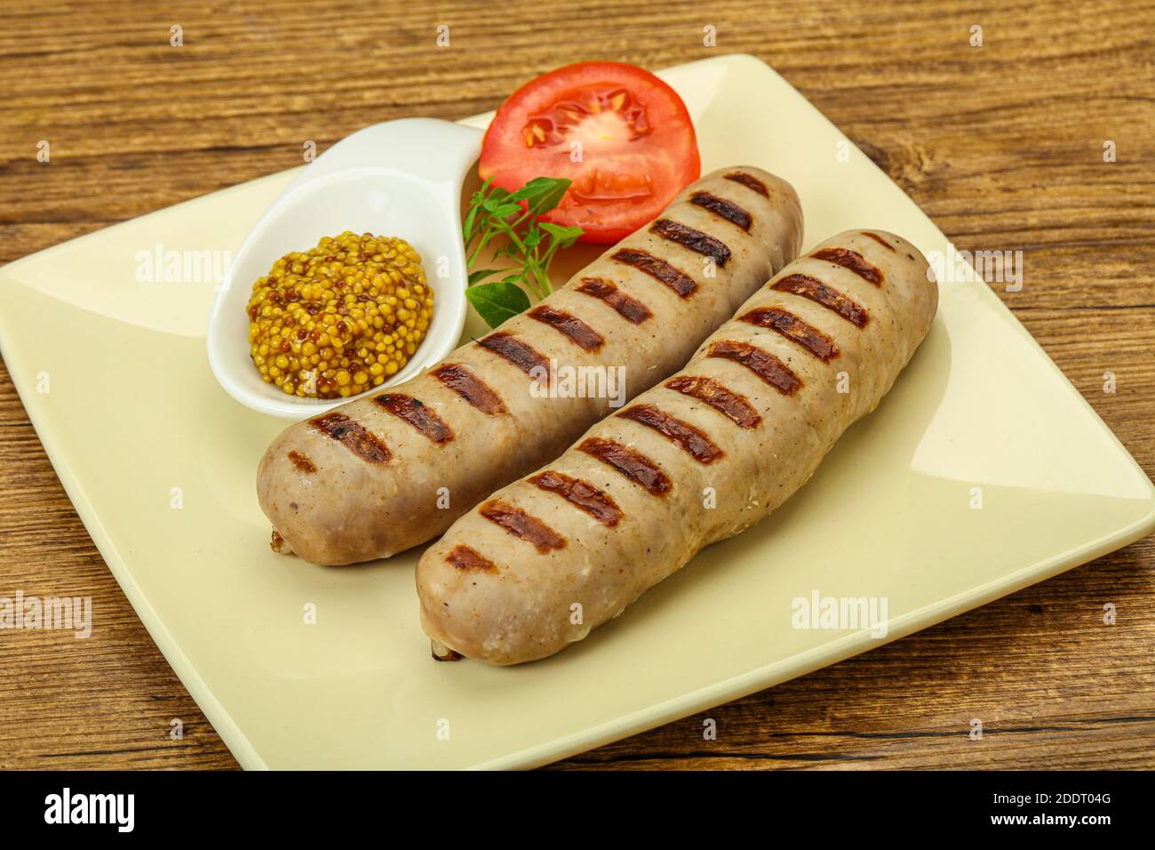 Saucisses de porc naturelles grillées à la sauce moutarde Photo Stock - Alamy