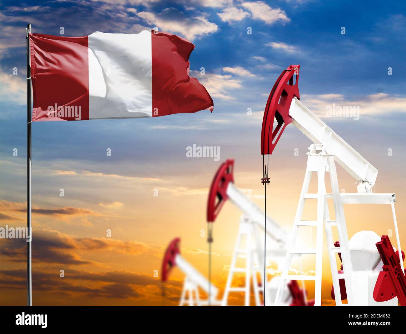 Des plates-formes pétrolières sur fond de ciel coloré et d'un mât avec ...