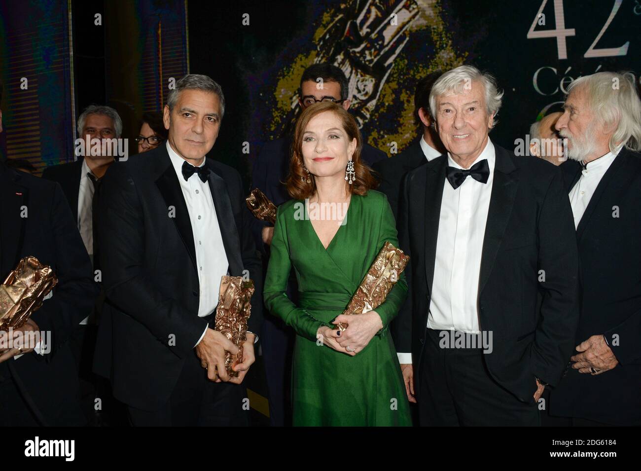 George Clooney, Isabelle Huppert et Paul Verhoeven lors de la 42e ...