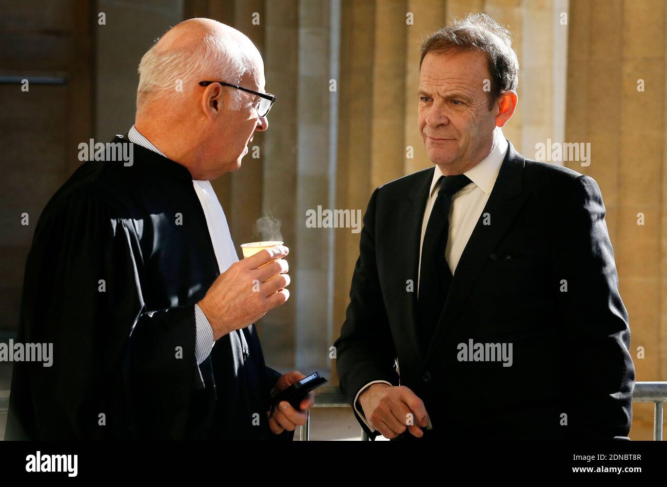 François-Marie Banier et son avocat Pierre Cornut Gentille arrivent ...