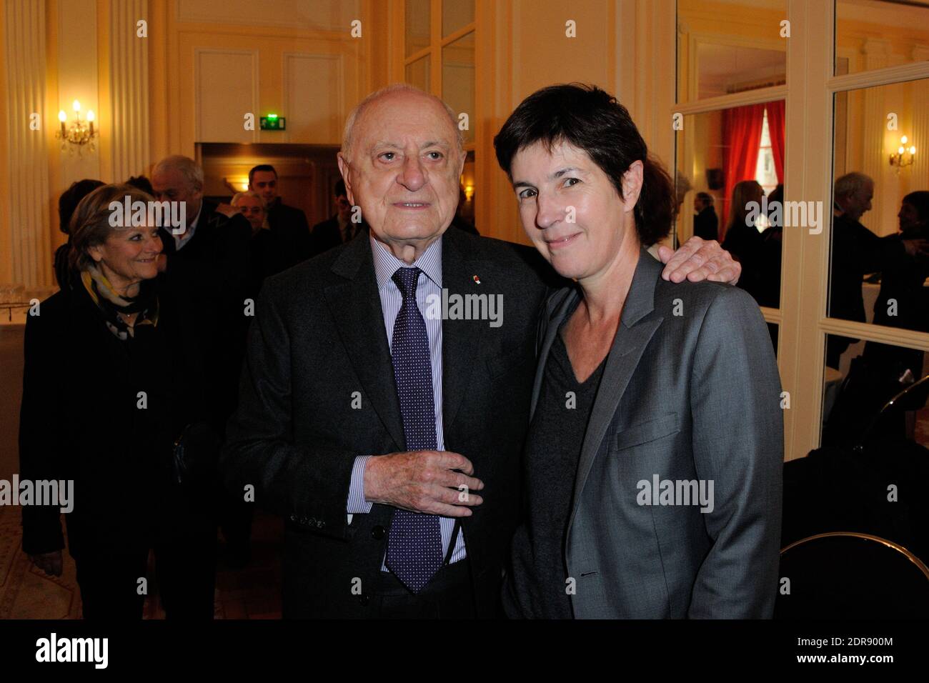 Christine Angot pose avec Pierre Berge après avoir reçu le Prix ...