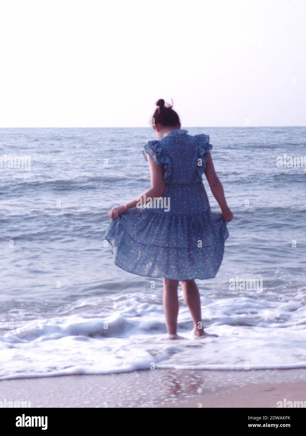 Mature woman wading in water Banque de photographies et d’images à ...