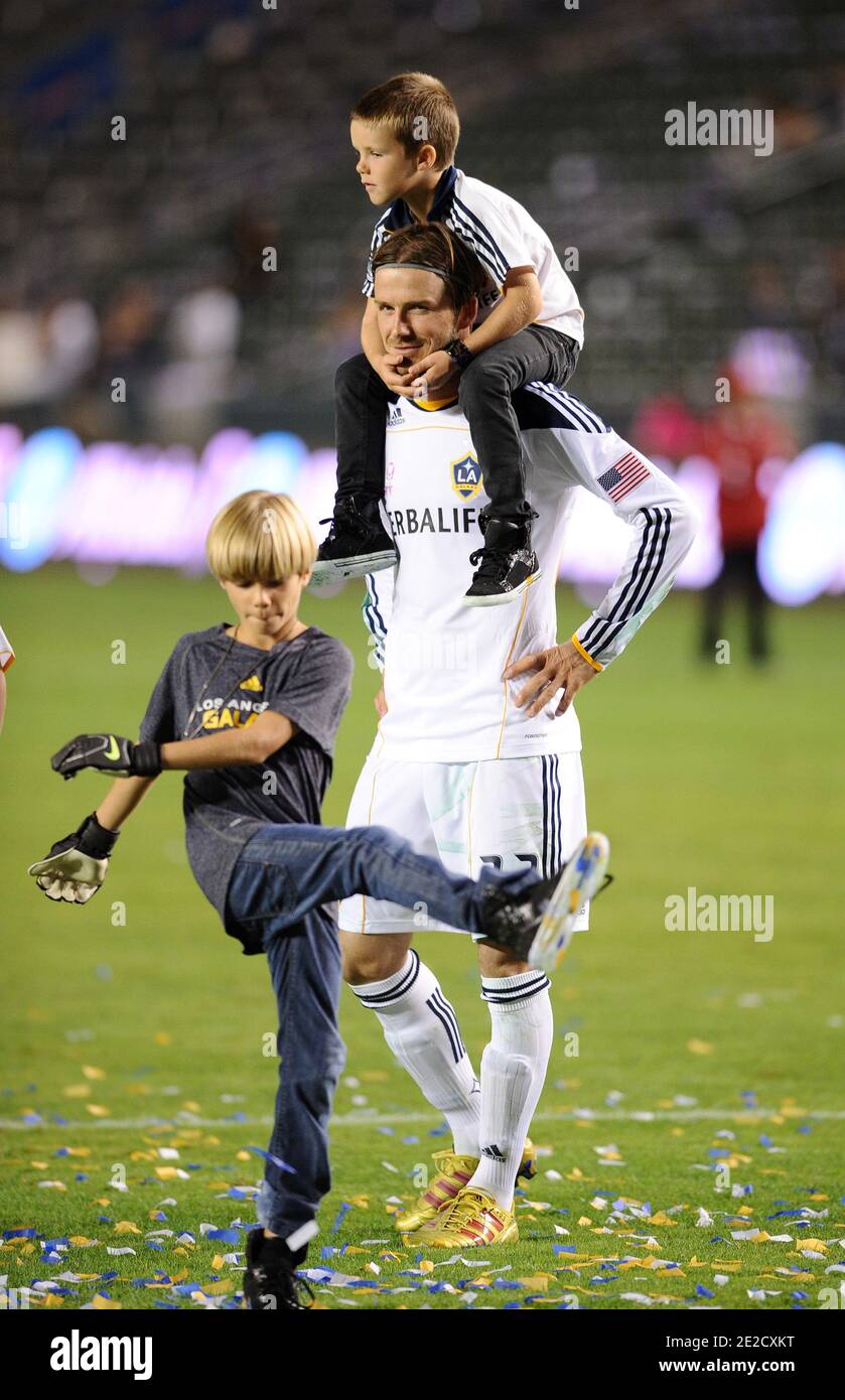 David Beckham avec ses fils Romeo, Brooklyn et Cruz sur le terrain ...