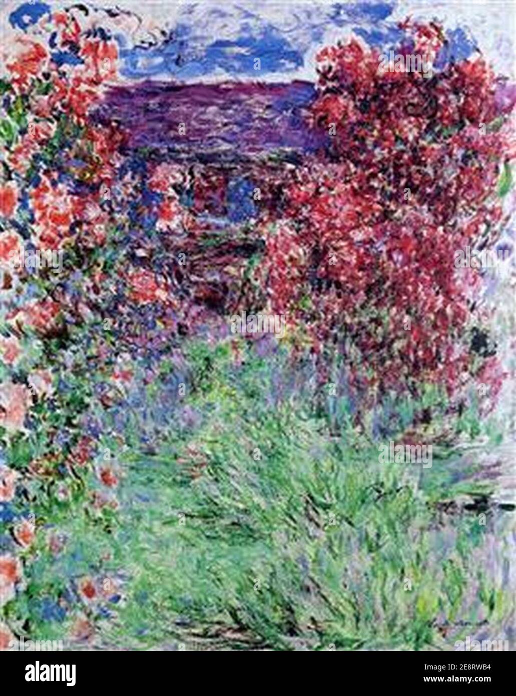 Maison parmi les roses Banque de photographies et d’images à haute ...