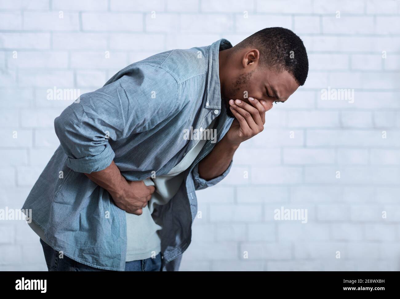 Homme Qui Vomit Banque De Photographies Et Dimages à Haute Résolution