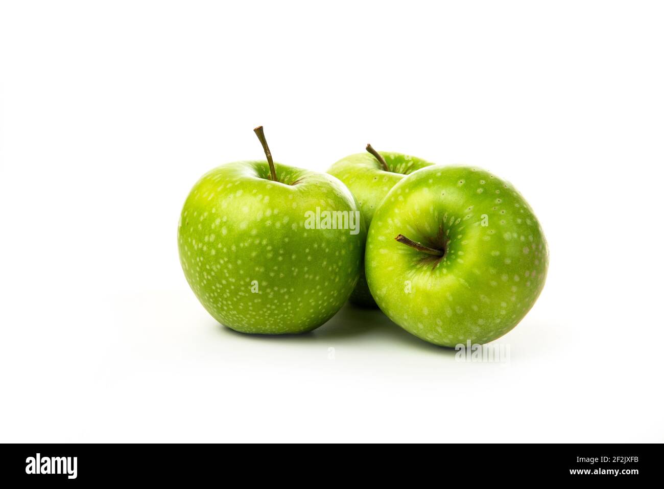 Trois pommes vertes Banque de photographies et d’images à haute ...