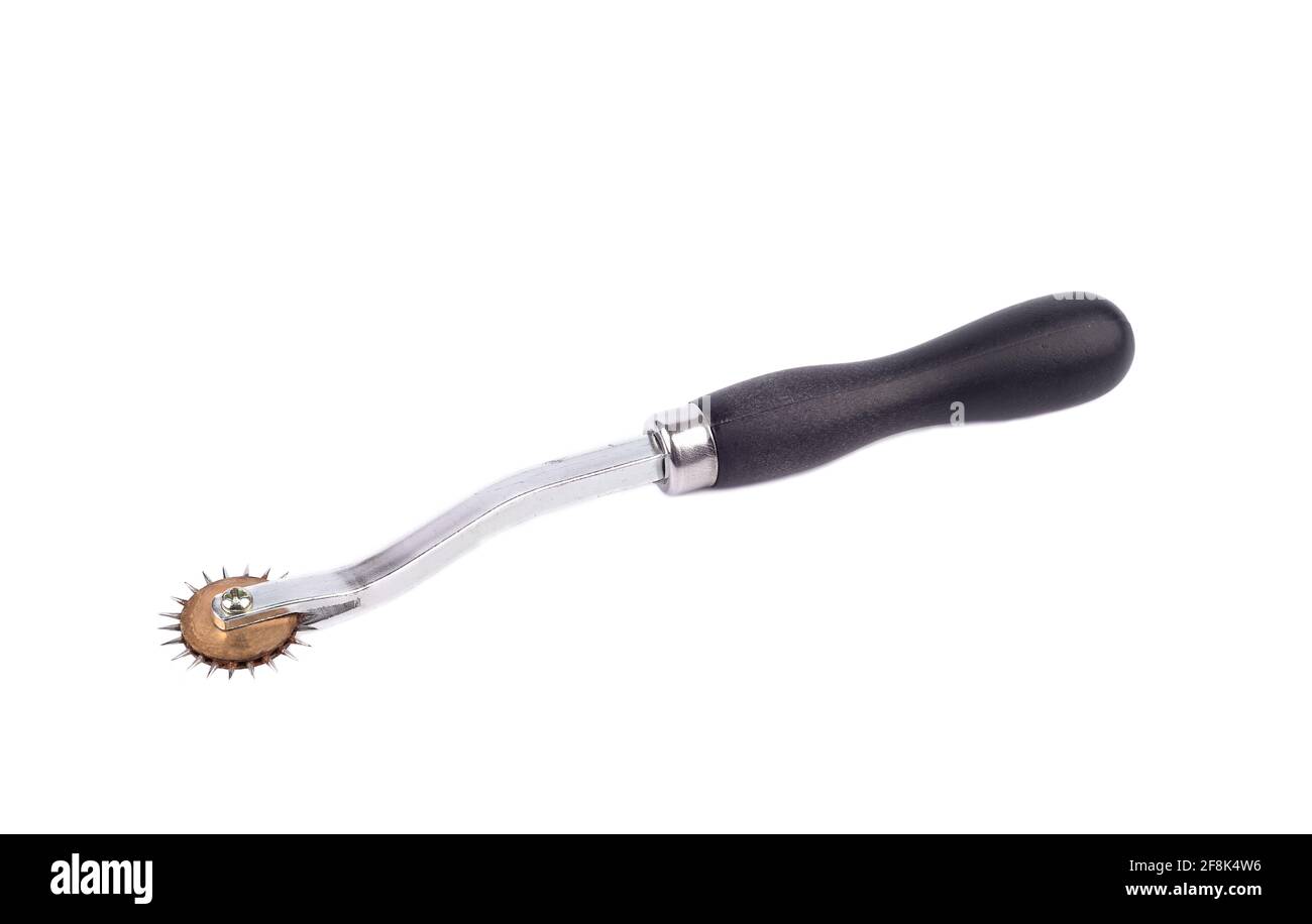 Perforateur à feuille avec roue tournante isolé sur fond blanc ...