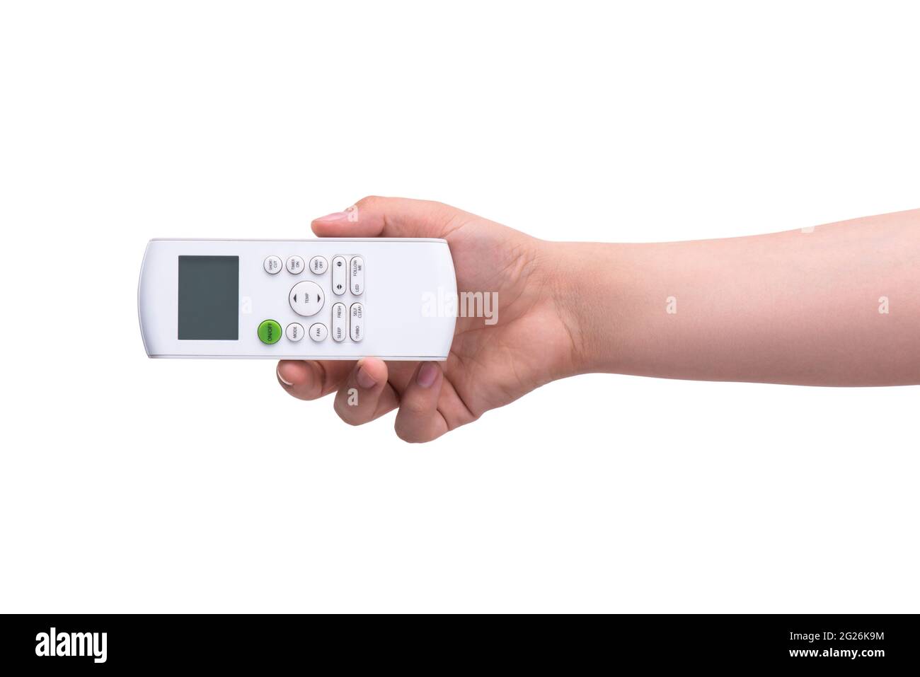 La main tient la télécommande du téléviseur et change de chaîne. Le ...