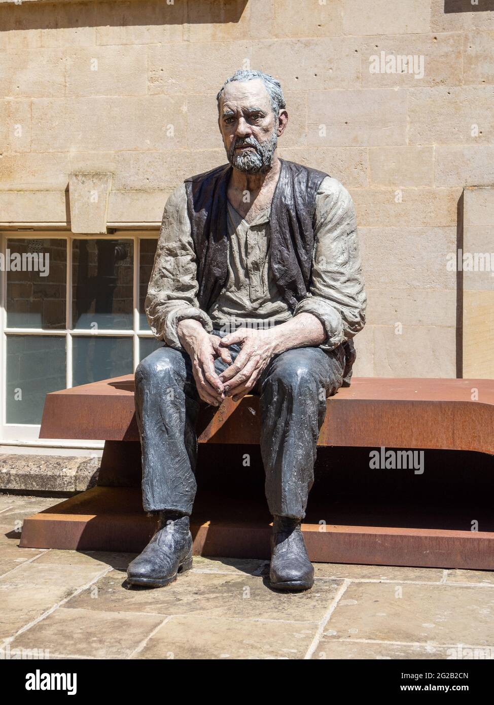 Sculpture homme assis Banque de photographies et d’images à haute ...