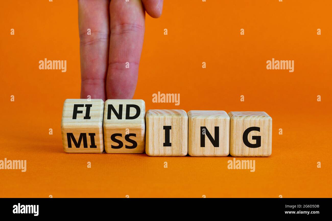 Symbole de recherche ou manquant. Homme d'affaires tourne des cubes en ...