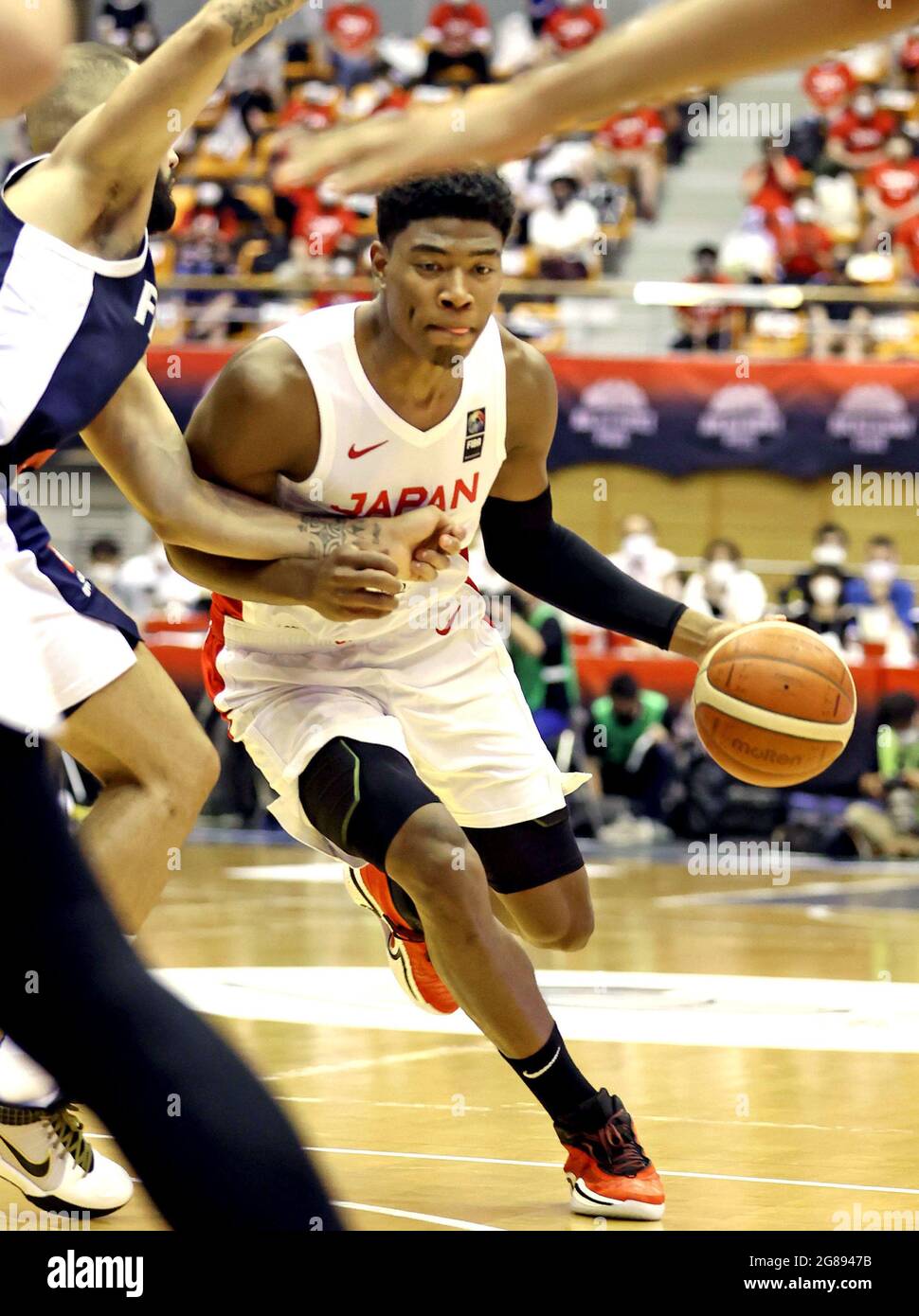 Rui Hachimura (C) du Japon joue pendant le premier quart d'un match d'échauffement contre la ...