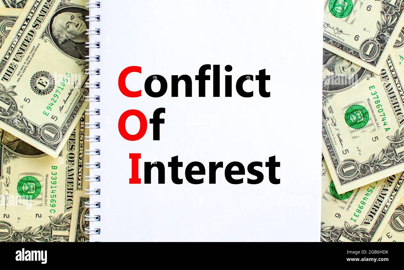 Symbole de conflit d'intérêts. Les mots « conflit d'intérêts » sur la ...