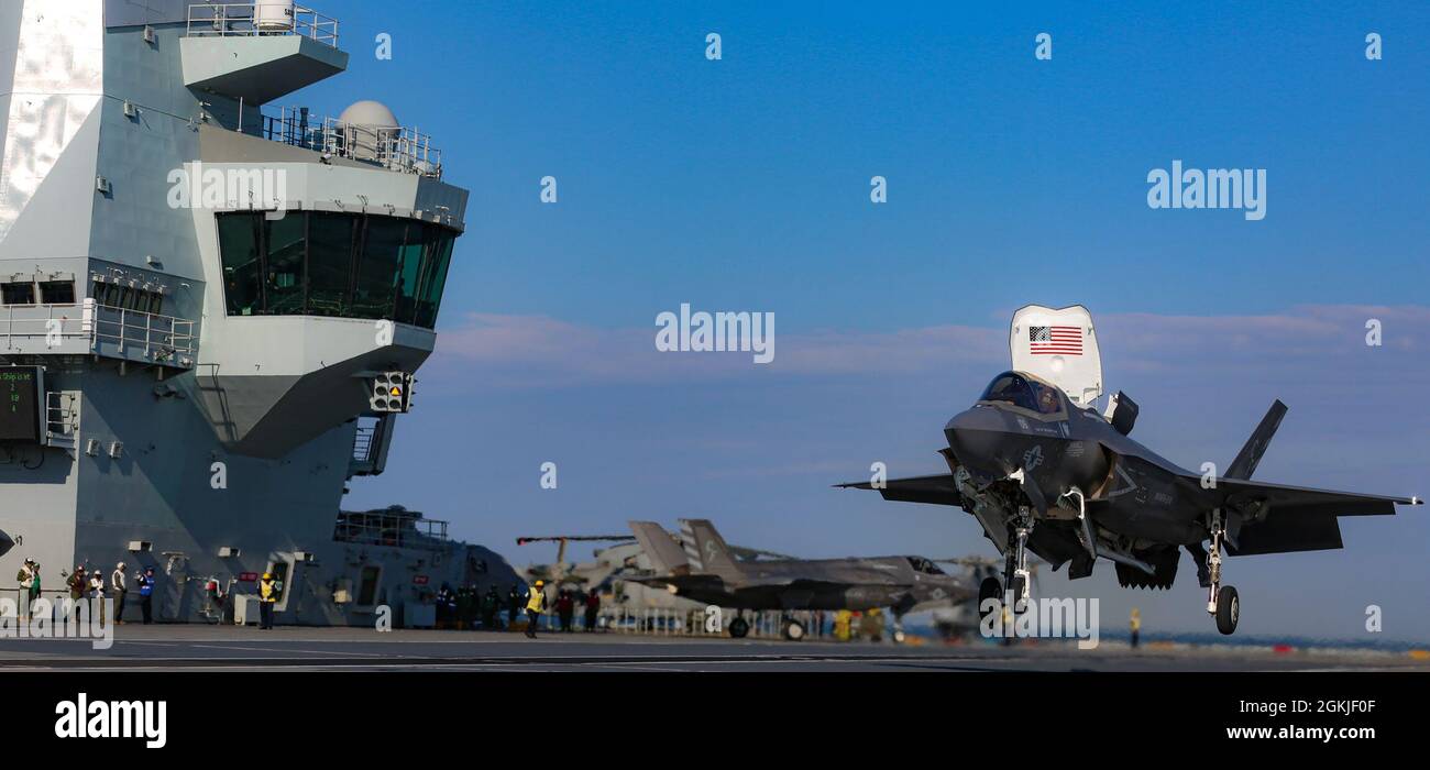 A Marine with Marine Fighter Attack Squadron (VMFA) 211, Carrier Strike ...