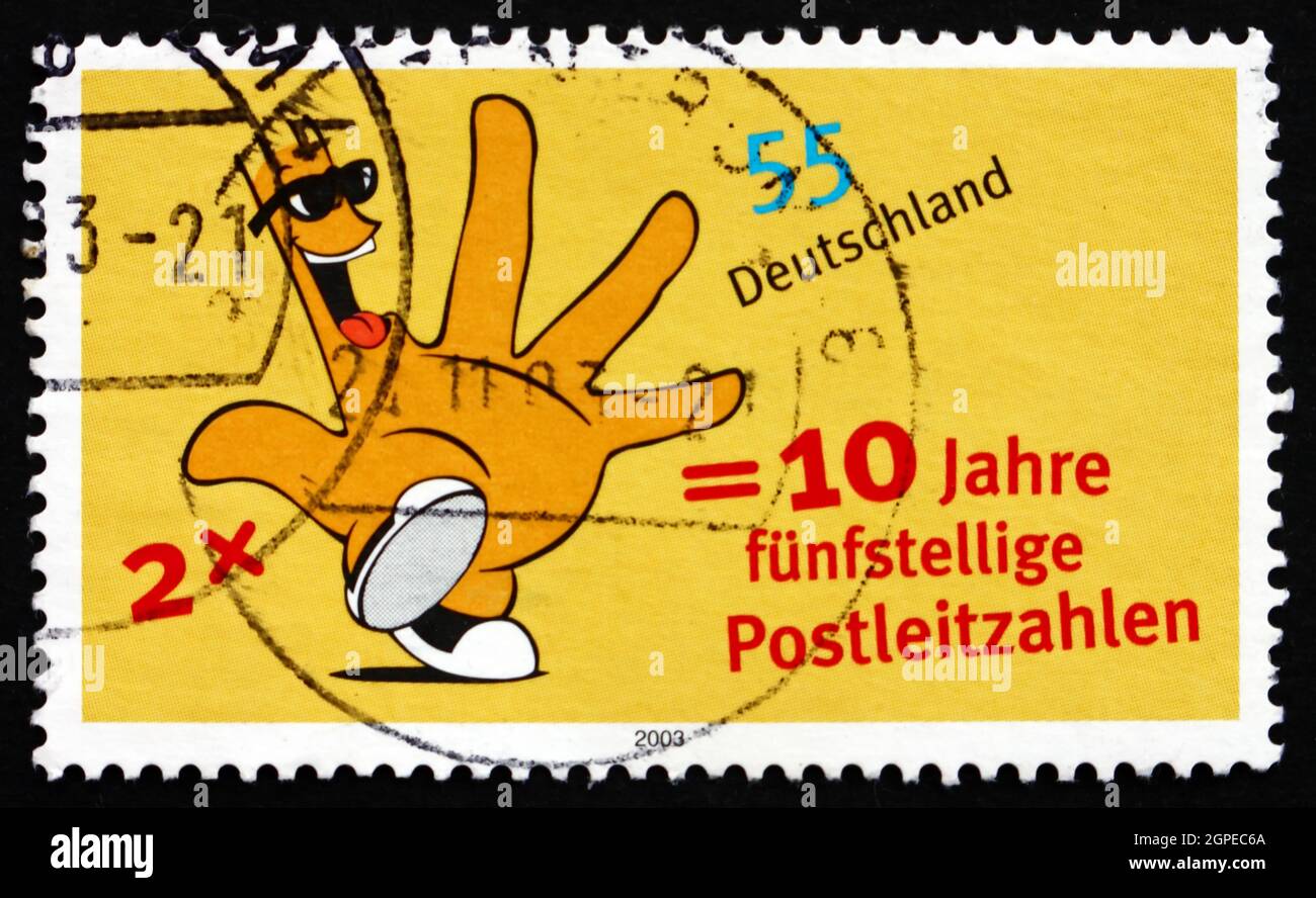 ALLEMAGNE - VERS 2003: Un timbre imprimé en Allemagne montre des codes ...