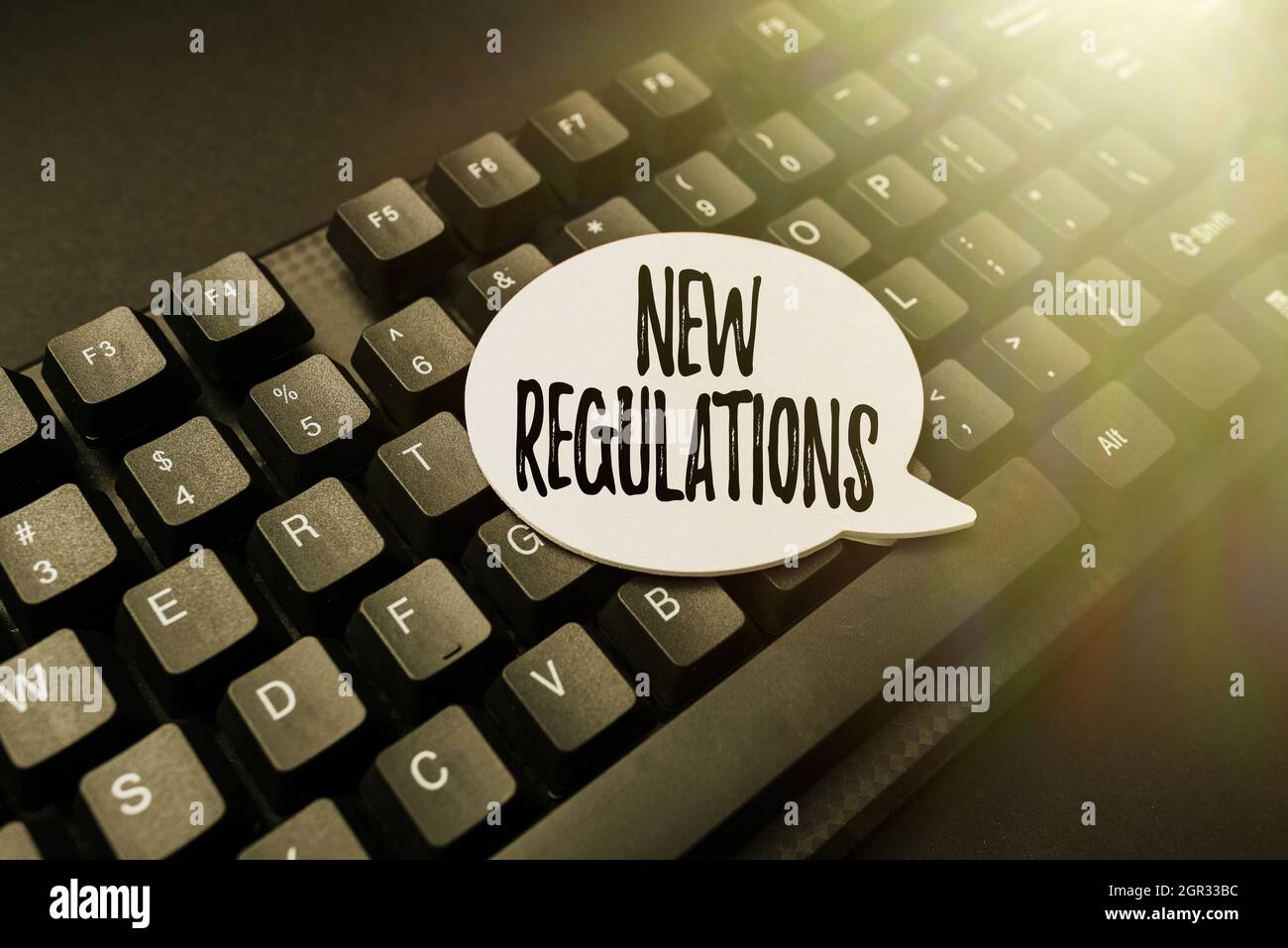Texte d'écriture Nouvelle question de réglementation. Mot écrit sur les ...