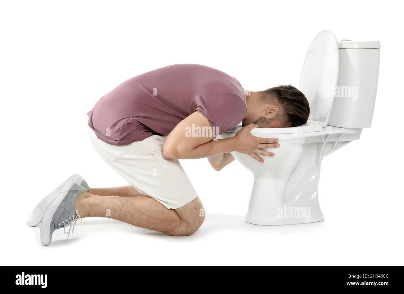 Young man drunk sick vomiting Banque de photographies et d’images à ...