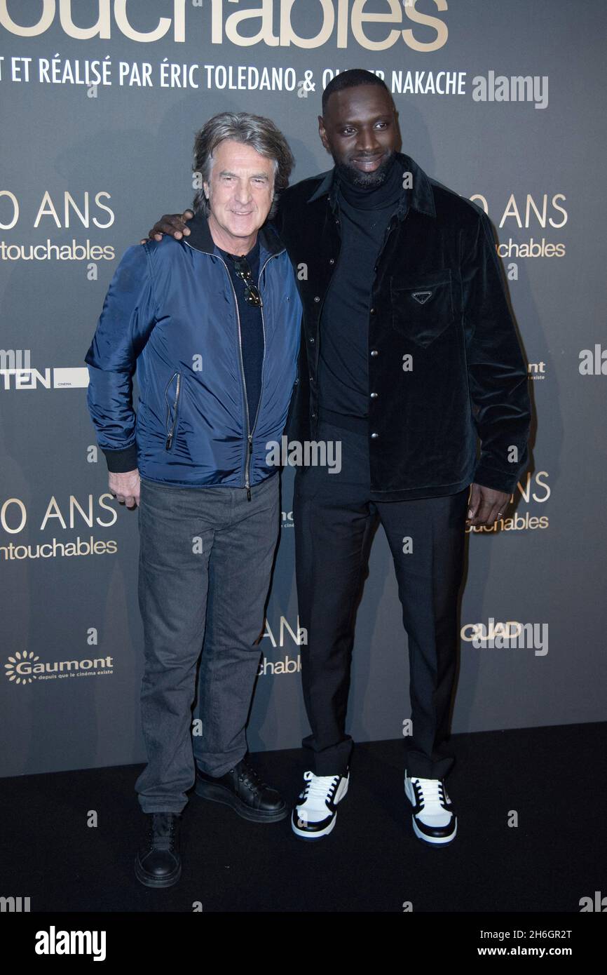 François Cluzet et Omar Sy assistant au 10e anniversaire du film ...