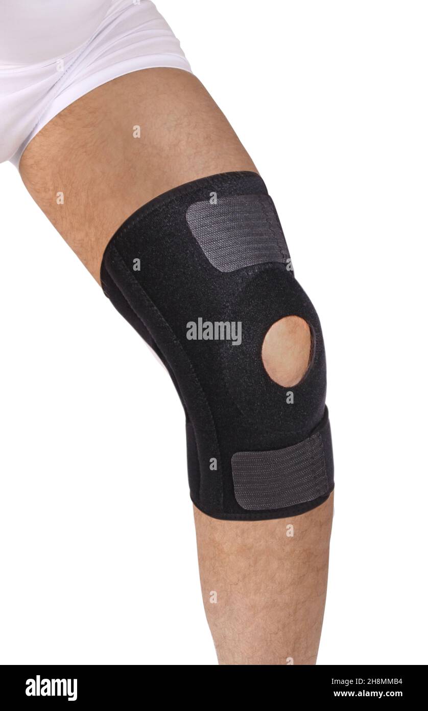 Renfort de support de genou sur la jambe isolé sur fond blanc ...