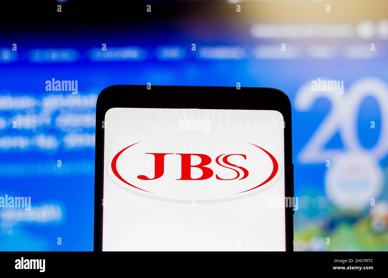 Sur cette photo, le logo JBS S.A. apparaît sur un smartphone.(Photo de ...