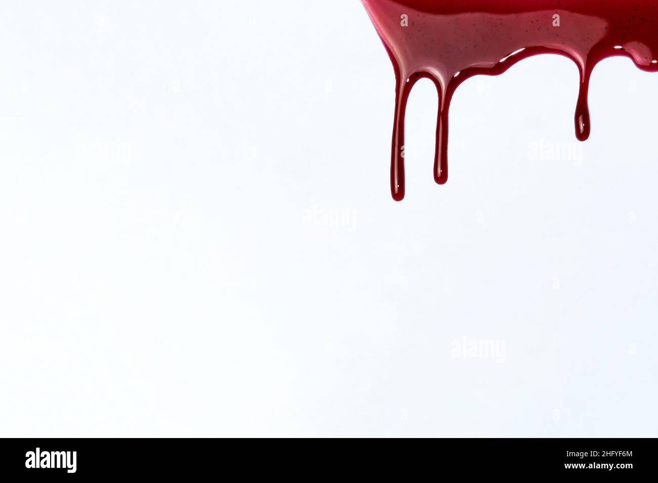 Une éclaboussure de sang.Un sang qui coule vers le bas.Un schéma ...