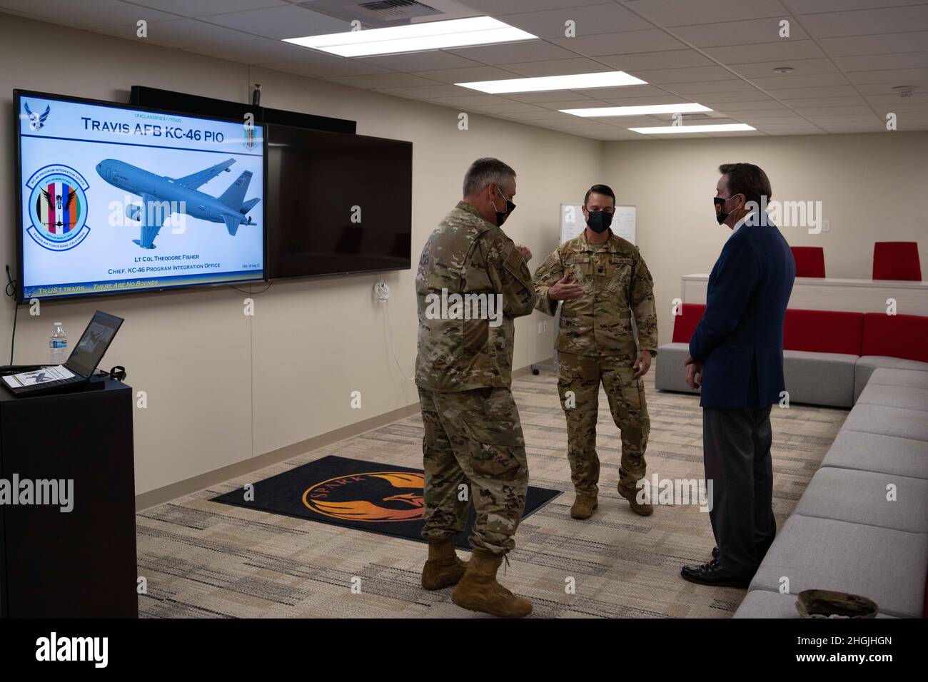U.S. Air Force Lt. Col. Theodore Fisher, centre, 60th Air Mobility Wing ...