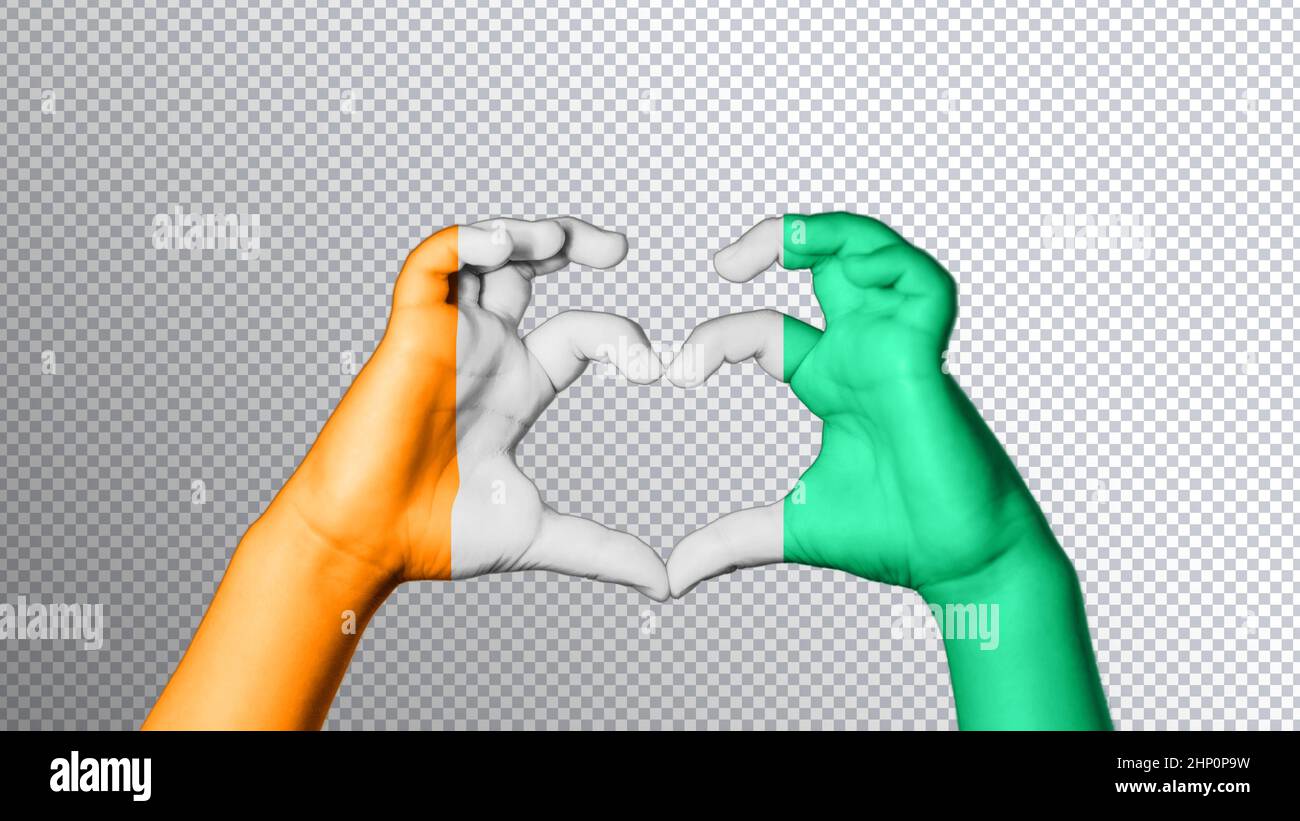Drapeau de la Côte d'Ivoire, les mains montrent le symbole du coeur et ...