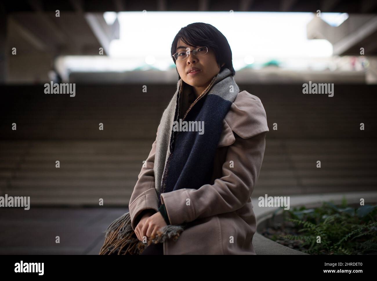 Vivian Ly, qui est autiste, prend une photo lors d'une pause dans les ...