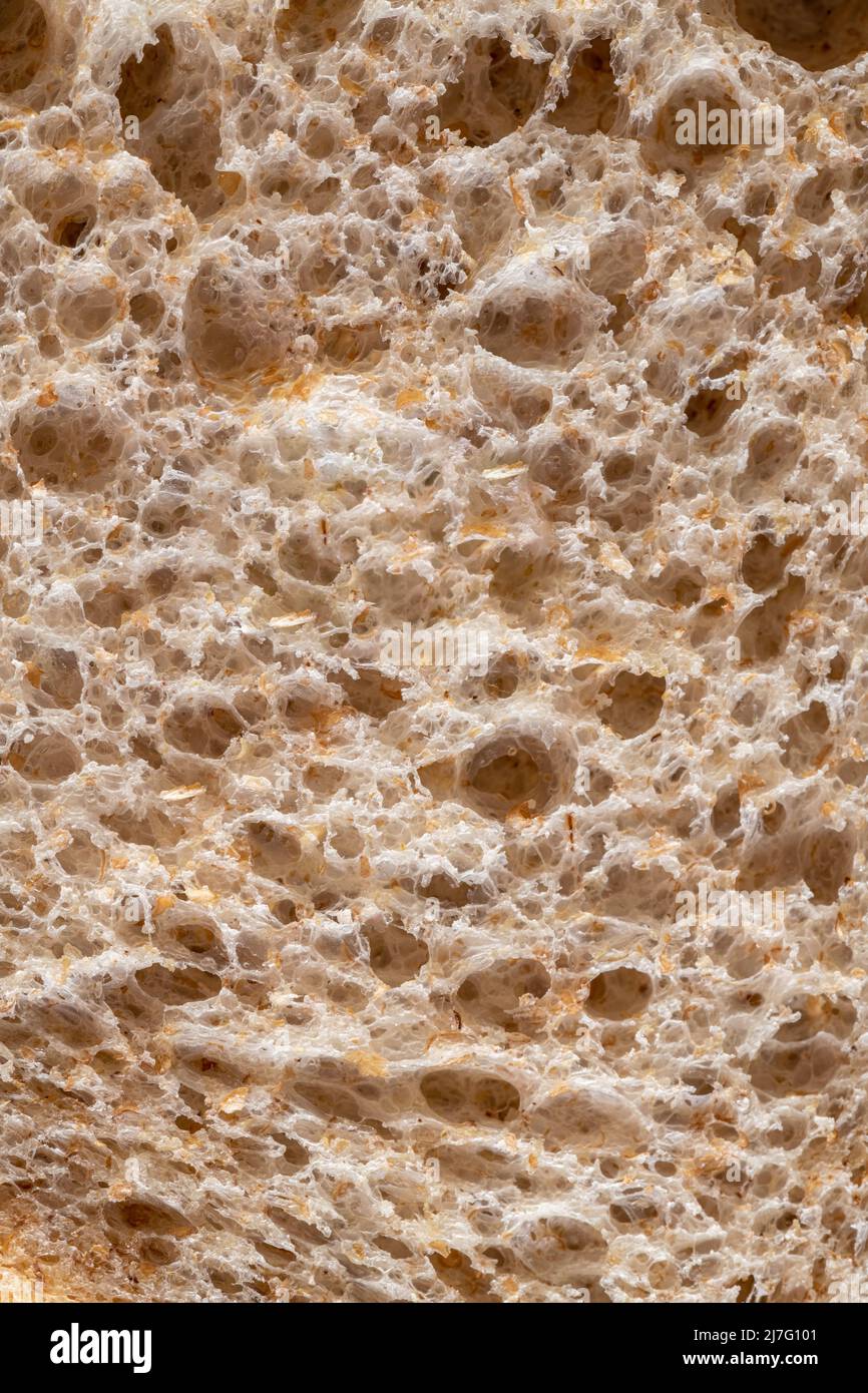 Texture de pain brun cuit à la farine de blé. Arrière-plan de texture ...