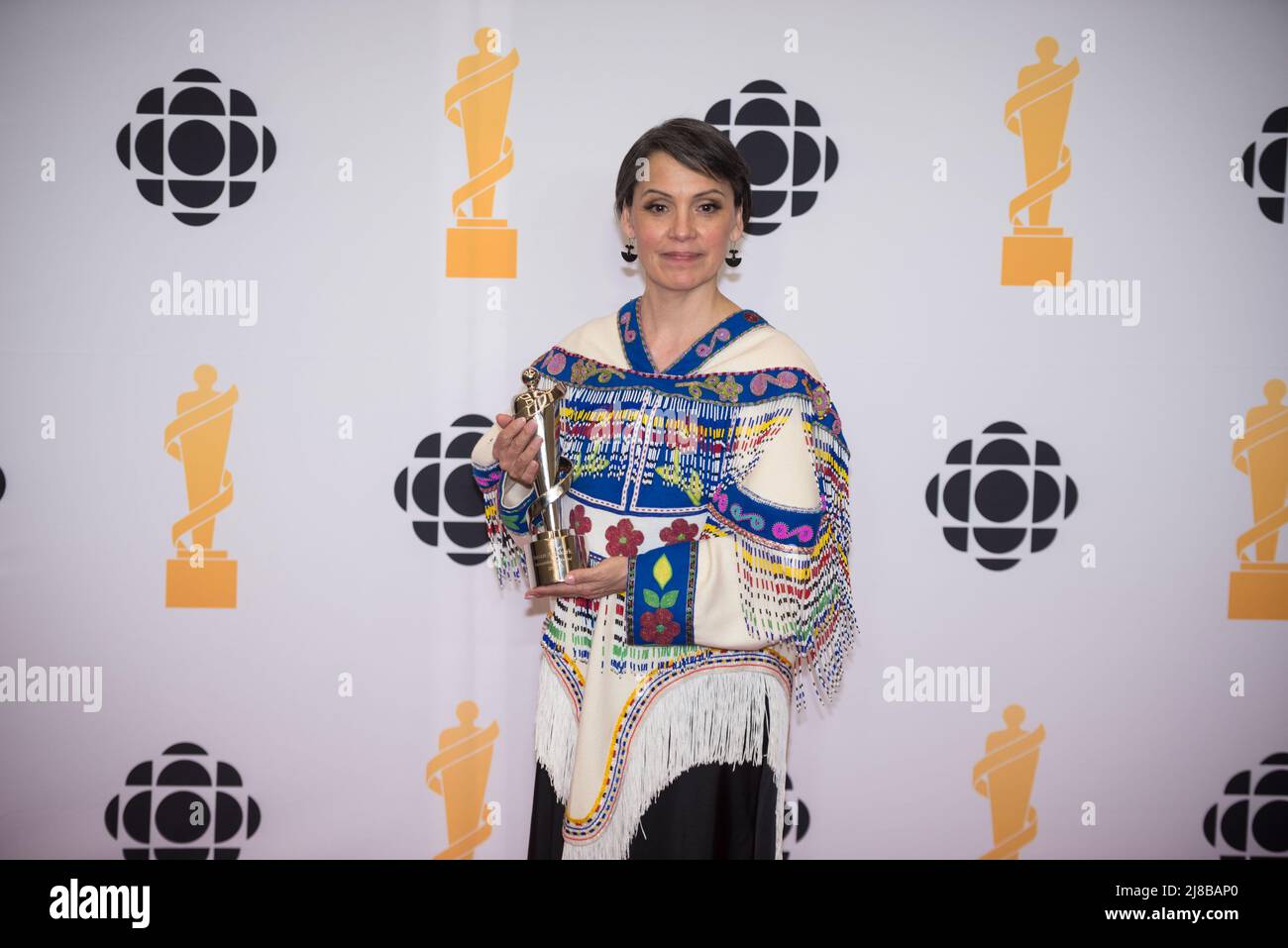Susan Aglukark pose une photographie au mur des médias après qu'elle a ...