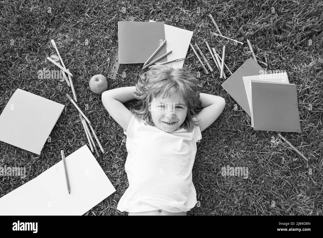 Boy doing english homework school Banque d'images noir et blanc - Alamy