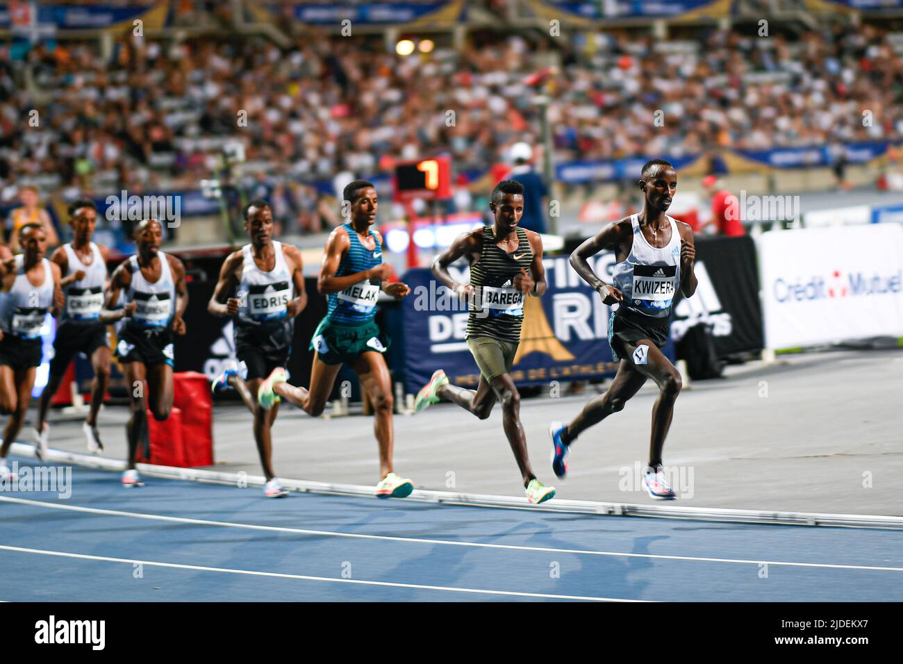 Rodrigue Kwizera et la course de peloton (course masculine 5000m) lors ...