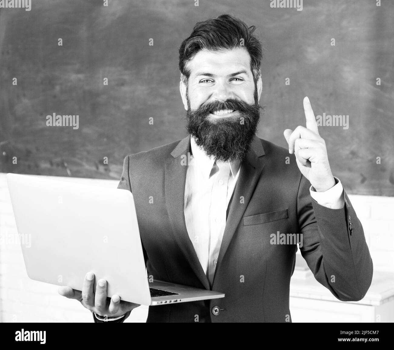 Enseignant masculin en classe Banque d'images noir et blanc - Alamy