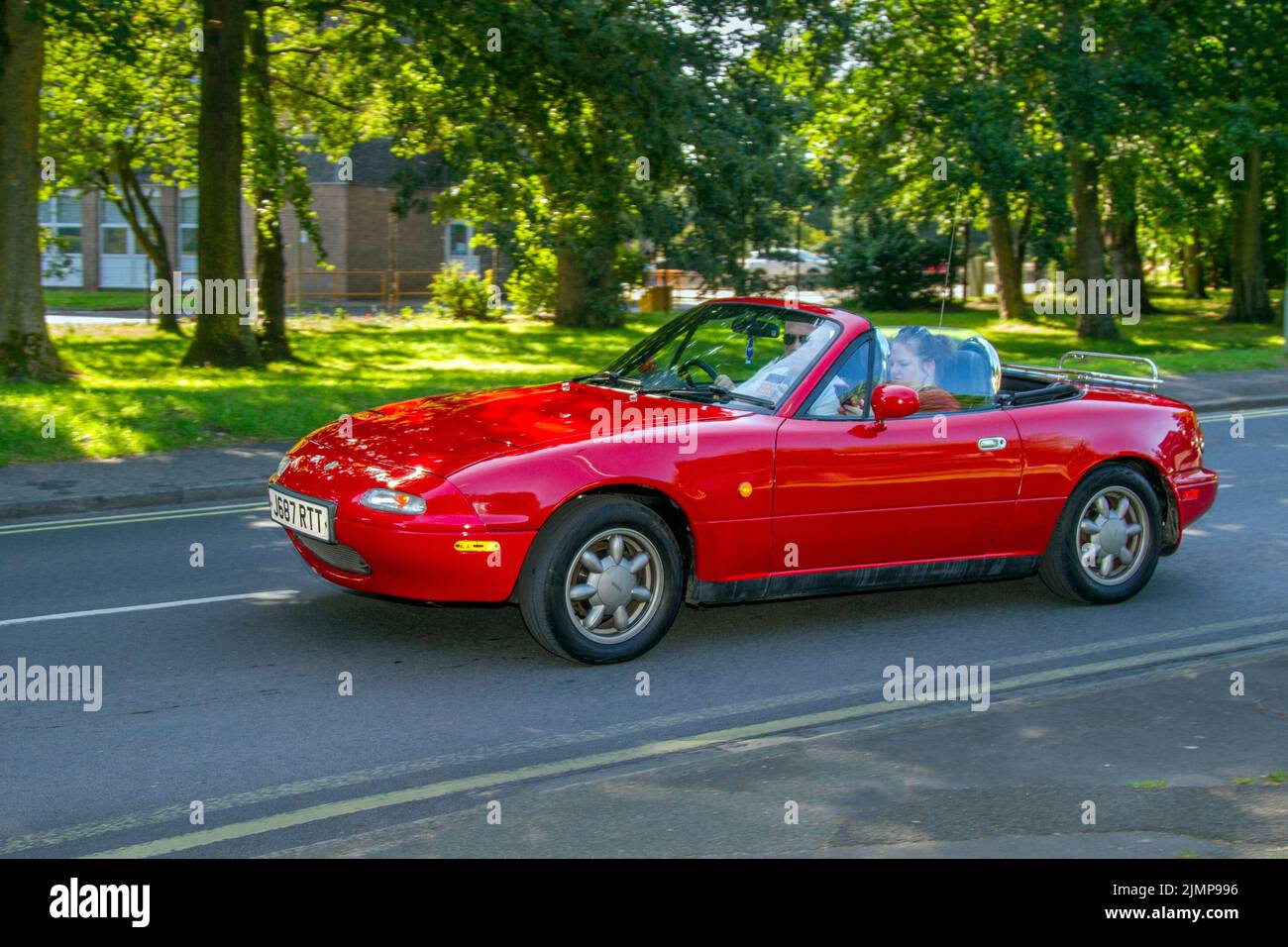 Miata red driving Banque de photographies et d’images à haute ...