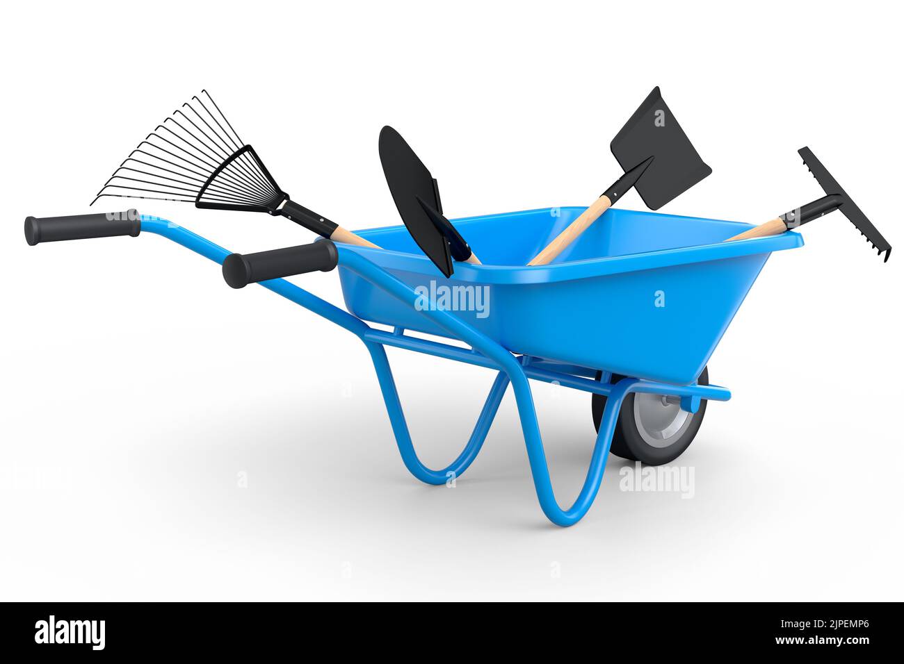 Brouette avec outils de jardin comme une pelle, un râteau et une ...