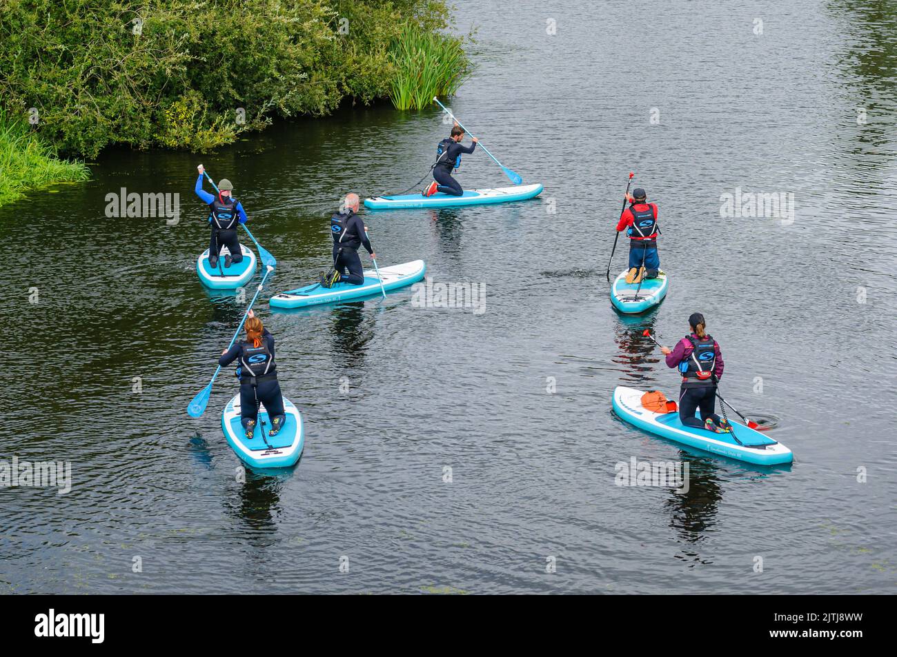 Teaching paddle boarding Banque de photographies et d’images à haute ...