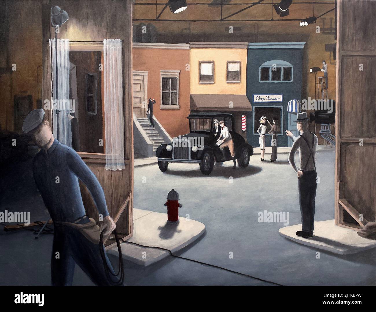 Scène vintage 1930s d'un film en action, avec le réalisateur passant ...