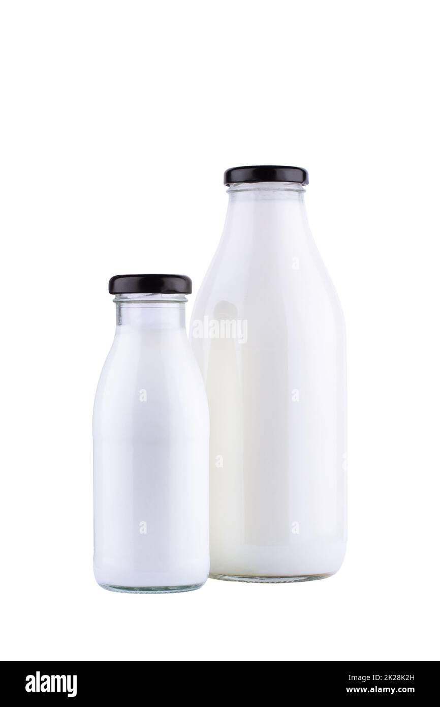 Bouteilles de lait sur fond blanc Banque de photographies et d’images à ...