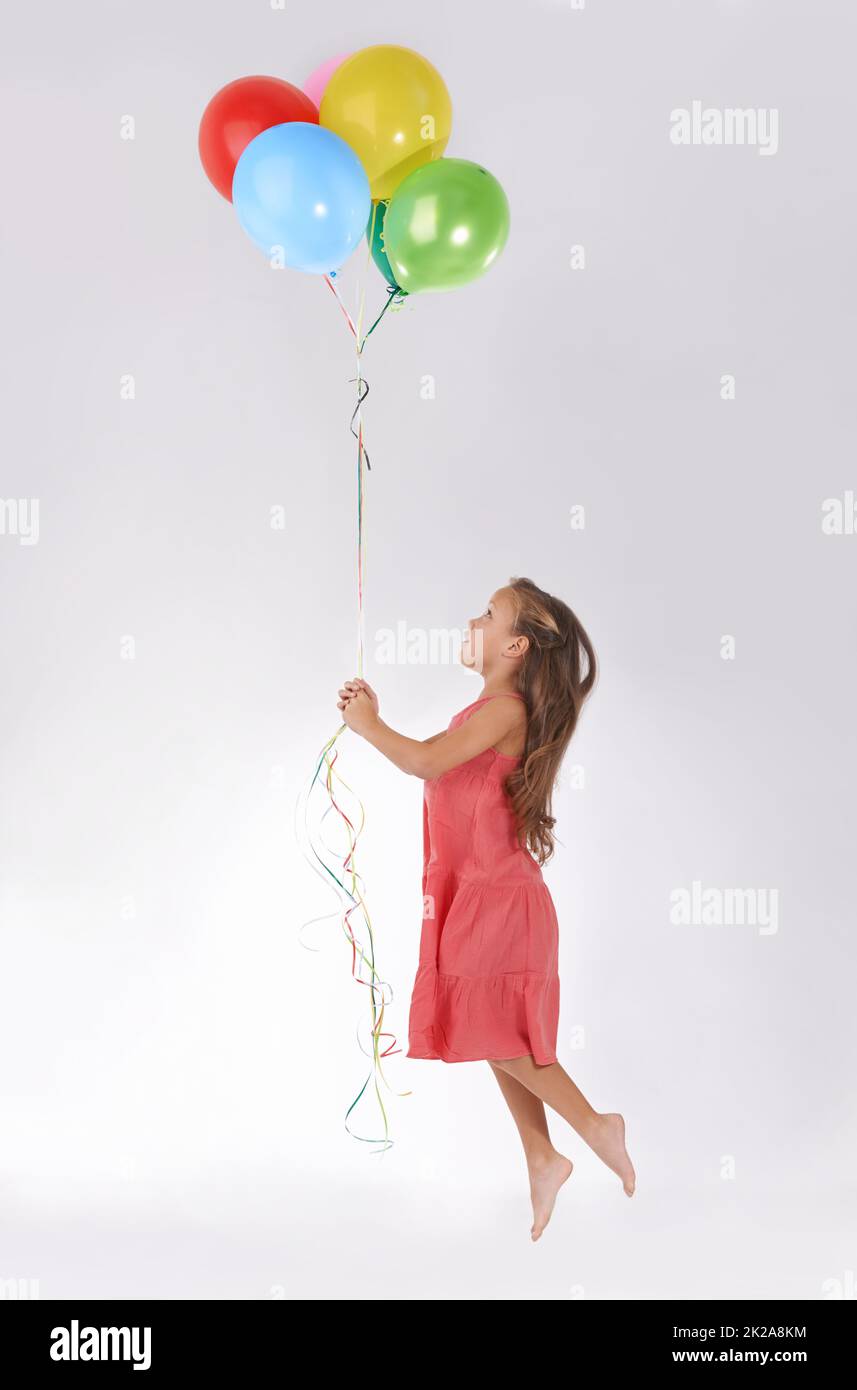 Lifted by balloons Banque de photographies et d’images à haute ...