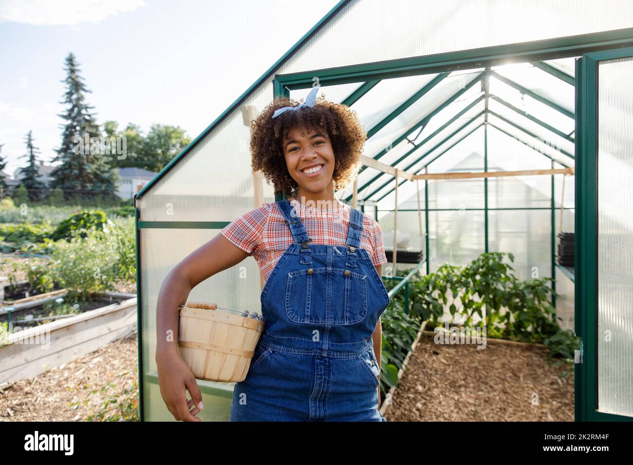 Fille de serre Banque de photographies et d’images à haute résolution ...