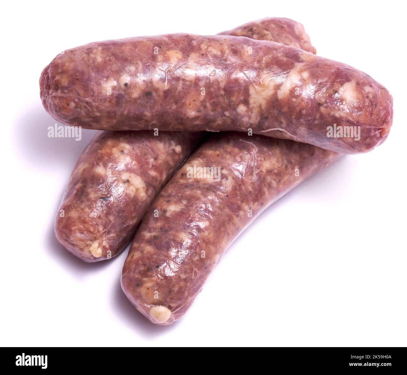 Saucisses crues au barbecue Banque d'images détourées - Alamy