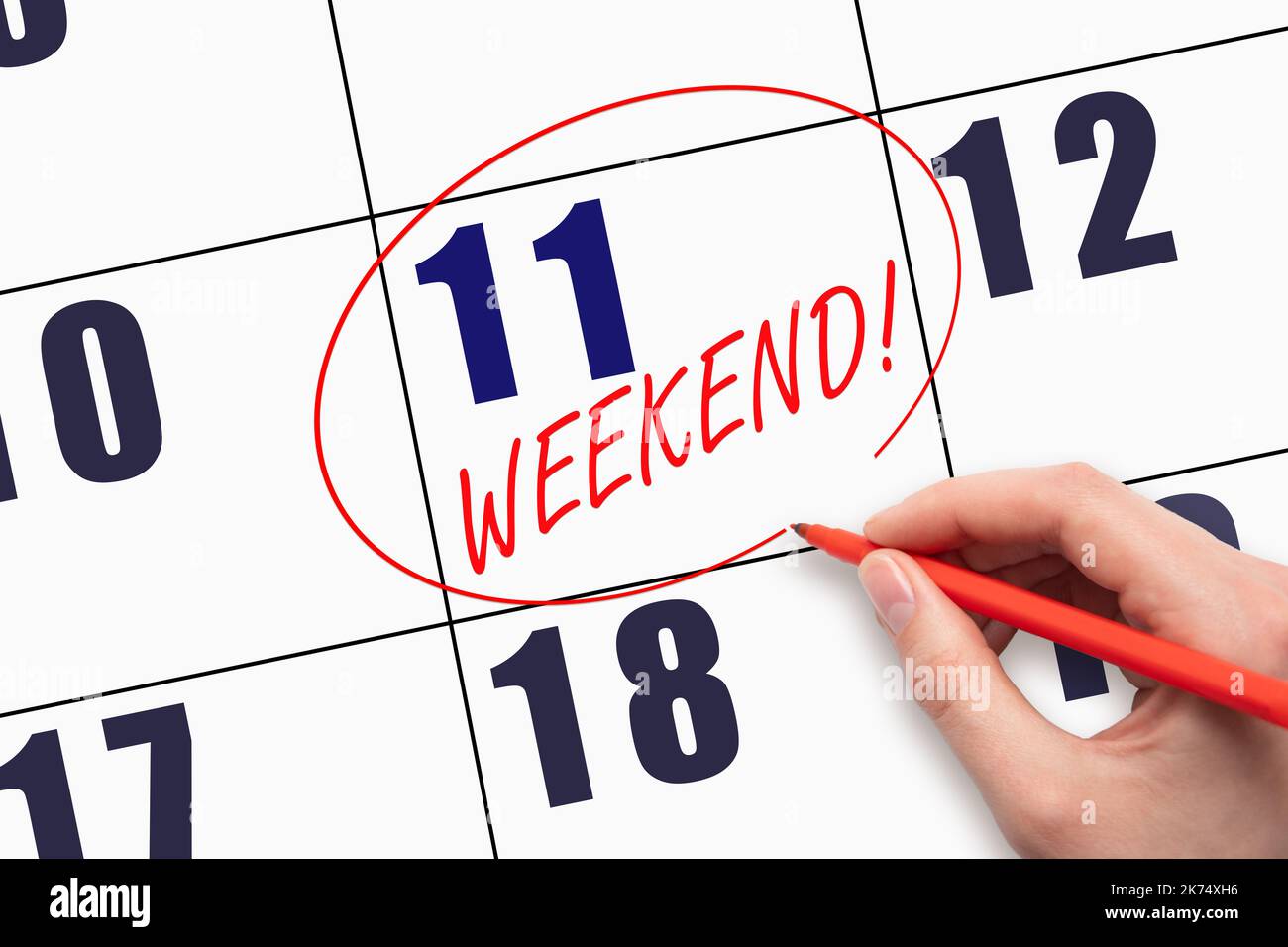 11th jour du mois. Écrivez à la main le texte WEEK-END et encercler la ...