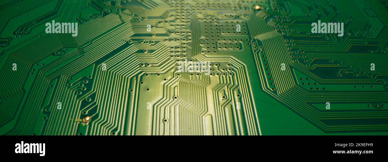 Carte de circuit imprimé électronique - gros plan. Carte mère électronique. Circuits et gros ...