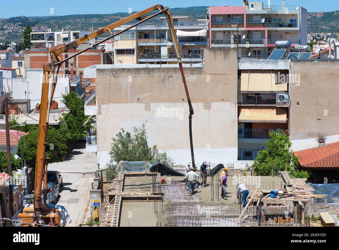 ouvriers de construction, construire la maison dans le centre-ville ...