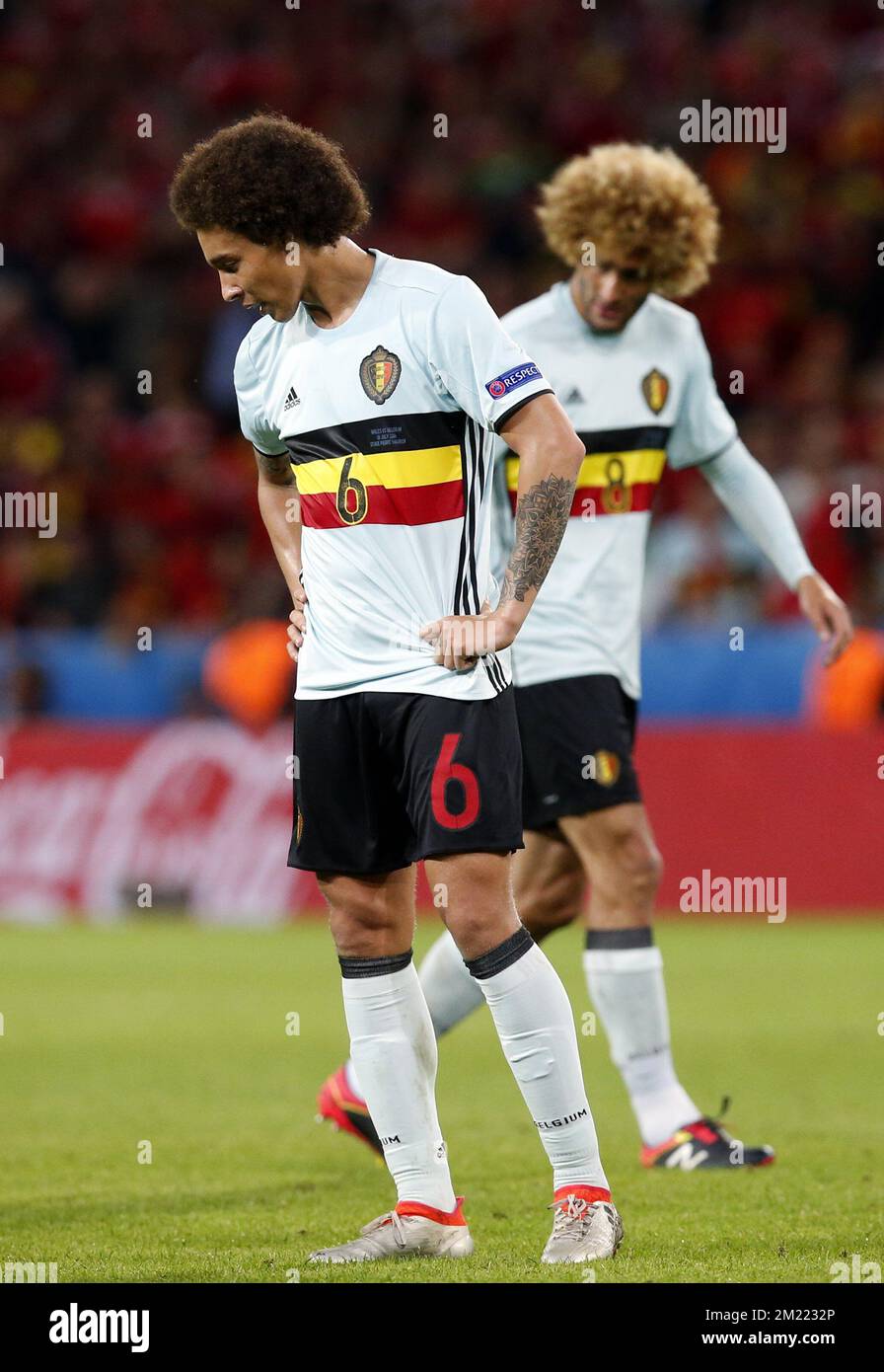 Axel Witsel en Belgique et Marouane Fellani en Belgique réagissent lors d'un match de football ...