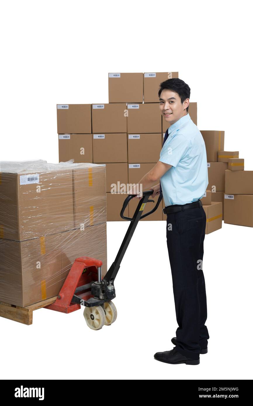 Pousser un chariot homme logistique Banque de photographies et d’images ...