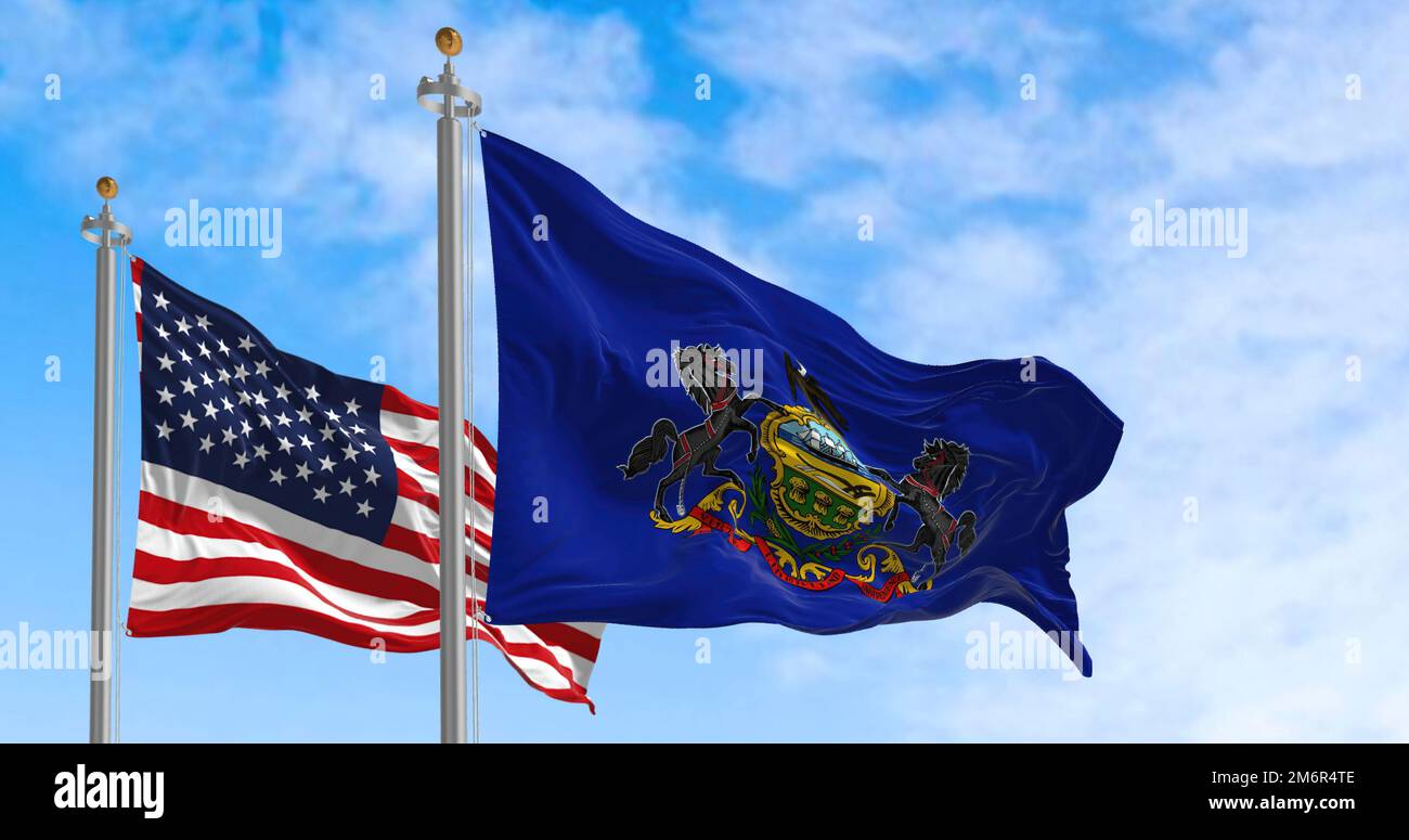 Drapeau de l'État de Pennsylvanie agitant le long du drapeau national ...