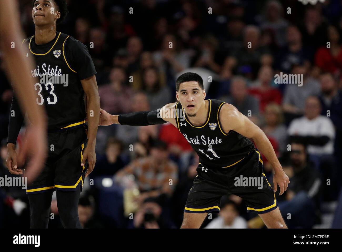 Kent State forward Miryne Thomas (33) and guard Giovanni Santiago (11 ...